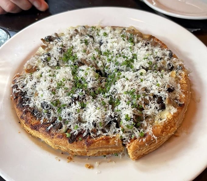 This mushroom tart isn't just a dish—it's architecture. Layers of buttery pastry and earthy mushrooms create a cathedral of flavor worth worshipping.