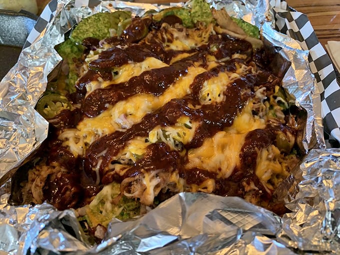 BBQ nachos: where Midwest meets Southwest in a beautiful, messy symphony of cheese, sauce, and perfectly smoked meat that requires both fork and fingers.