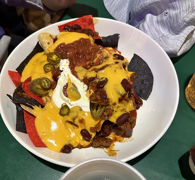 Nachos that require a strategy to eat—each chip a delivery system for chili, cheese, jalapeños and sour cream in perfect harmony.