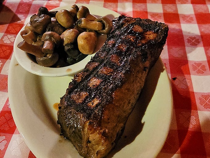 This New York Strip with sautéed mushrooms isn't just dinner—it's a religious experience with a side of fungi.