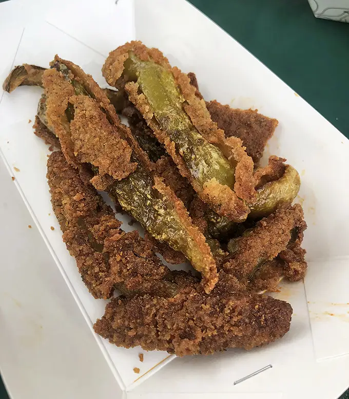 Crispy fried pickles that shatter with each bite—the perfect marriage of tangy dill and crunchy coating that defies you to eat just one.