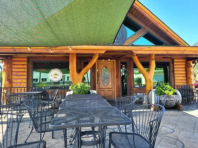 That log cabin charm isn't trying too hard – it's exactly what a lakeside eatery should look like.