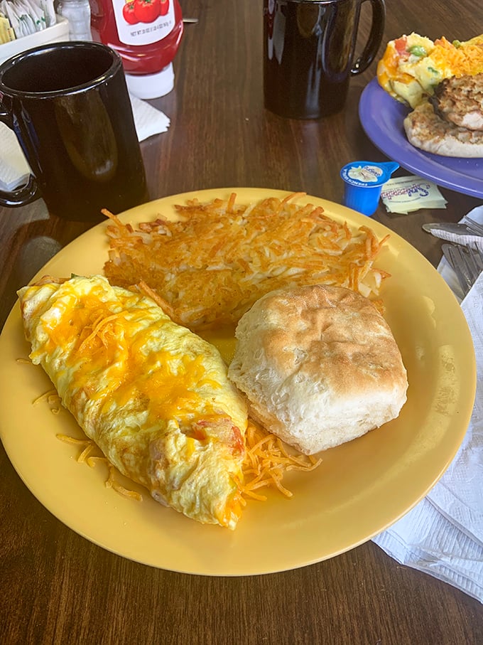 An omelet that knows its purpose in life is to deliver cheese, perfectly cooked eggs, and a side of those legendary hash browns.