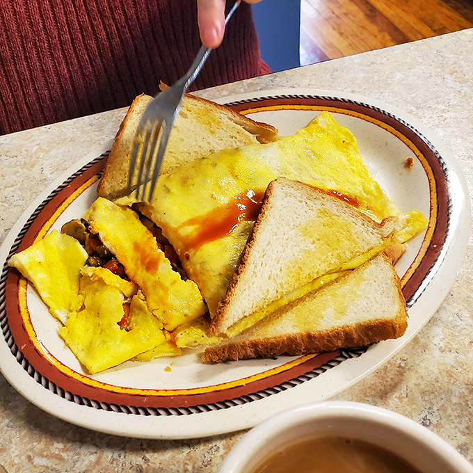 Sunshine on a plate. This omelet doesn't need truffle oil or a fancy name—just honest ingredients and the promise of a better day.