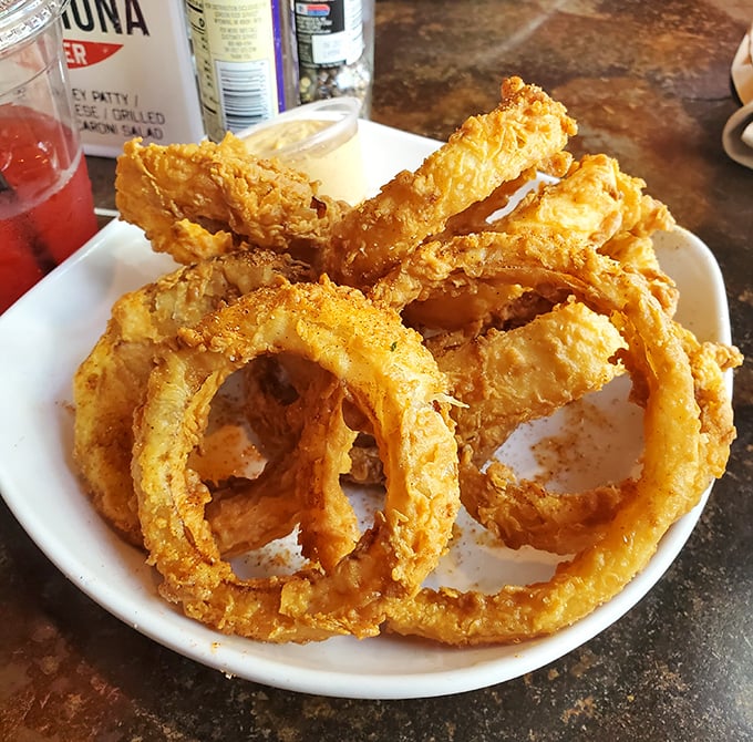 These onion rings aren't just golden—they're Olympic medal winners in the deep-fried Olympics.