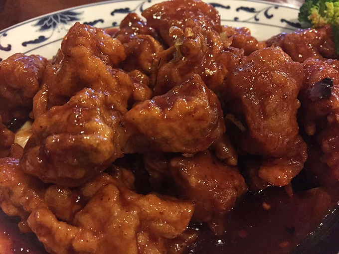 Orange chicken done right – glossy, tender, and worth every single sticky-fingered moment of bliss.