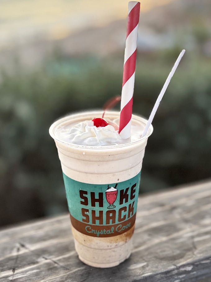 This isn't just a milkshake—it's a hand-held vacation with a cherry on top. Thick enough to require serious straw commitment.
