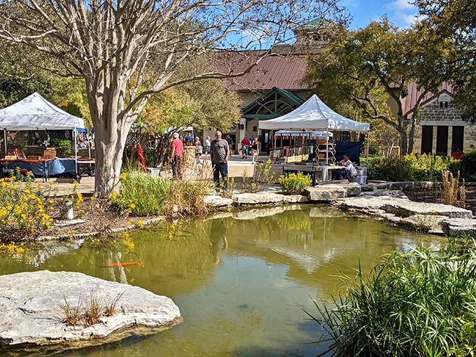 Market day by the pond—where local artisans gather, shoppers meander, and even the fish seem to be enjoying the festive atmosphere.