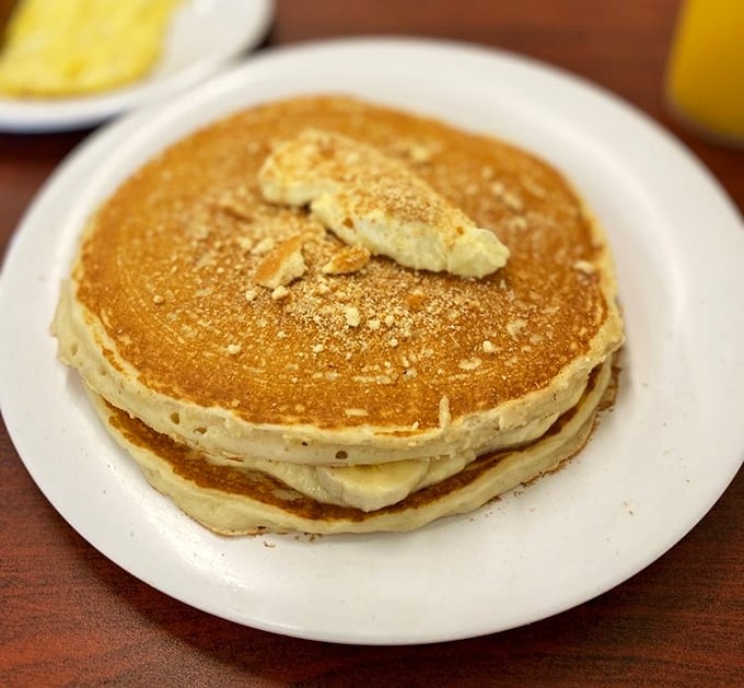 These golden pancakes aren't just cooked—they're crafted. The perfect butter-to-pancake ratio creates that melt-in-your-mouth moment breakfast dreams are made of.