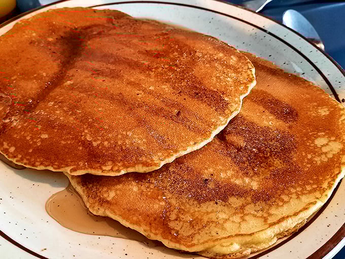 Pancakes with the ideal golden-brown exterior that makes you wonder if they hired a pancake artist just to get that perfect color.