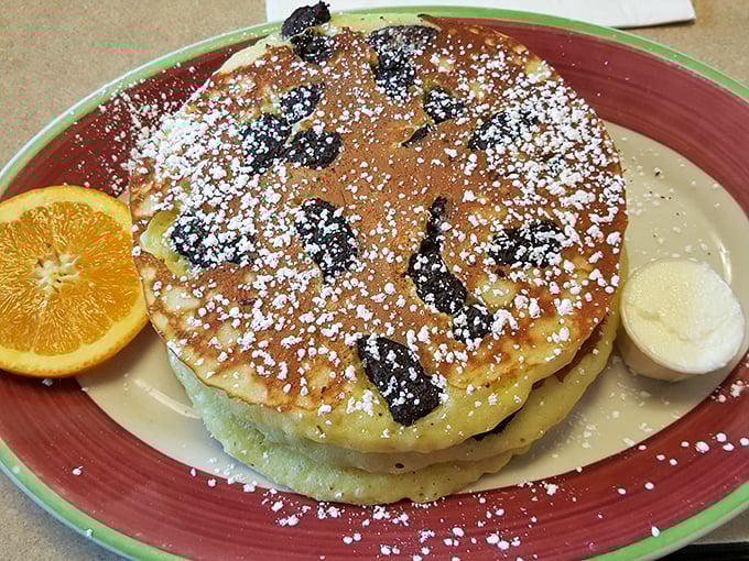 Pancakes that don't just satisfy hunger but spark joy—golden, fluffy, and dusted with powdered sugar like the first perfect snowfall.