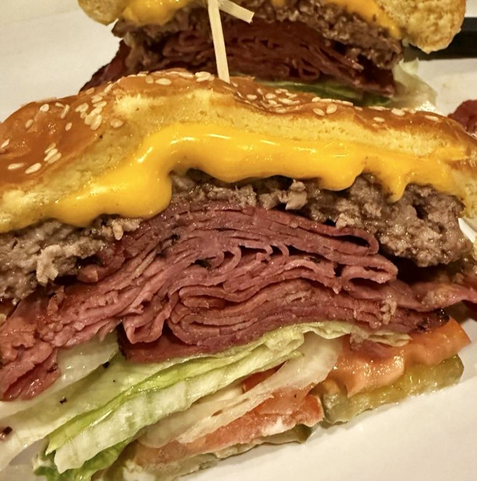 The pastrami burger – where deli meets diner in a glorious stack of beef, melted cheese, and thinly sliced pastrami that would make New York jealous.