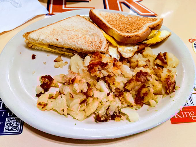The breakfast sandwich and home fries—simple perfection that reminds us sometimes the best things in life don't need reinvention.