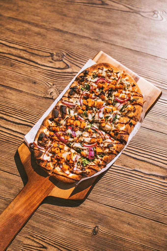 Pizza perfection—crispy-edged, generously topped, and begging to be folded New York-style while contemplating life's important questions.