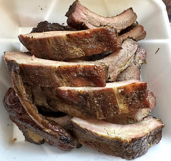 These ribs have that mahogany bark that makes barbecue lovers weak in the knees—substantial yet yielding, like a good handshake.