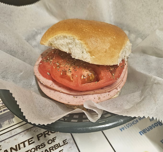 Simple perfection—a round roll, quality meat, and the confidence to let the ingredients speak for themselves. No Instagram filters needed here.