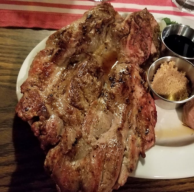 Surf meets turf in perfect harmony—those shrimp look like they jumped onto the plate just to hang out with that glorious steak.