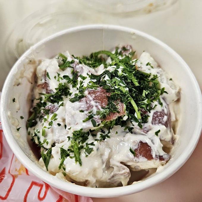 Potato salad dressed to the nines with herbs – the cool cousin at the spicy family reunion.