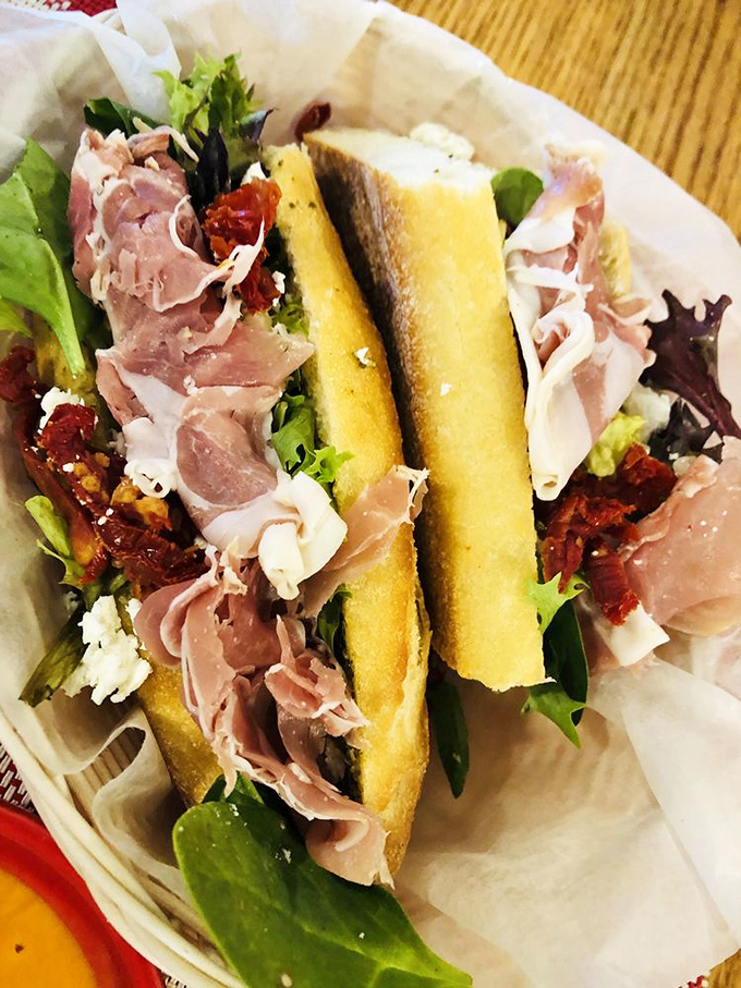 Not all heroes wear capes; some come wrapped in French baguette with prosciutto, greens, and sun-dried tomatoes.