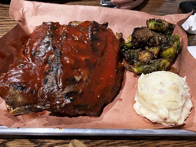 Ribs that don't just fall off the bone – they practically leap into your mouth. That sauce has secrets older than most Delaware towns.