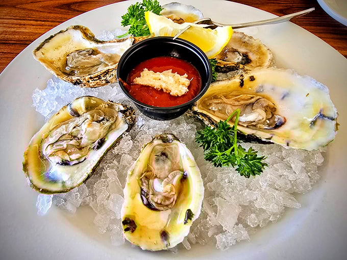 Fresh oysters on ice—nature's perfect appetizer served with just enough accoutrements to enhance, never mask, their briny brilliance.