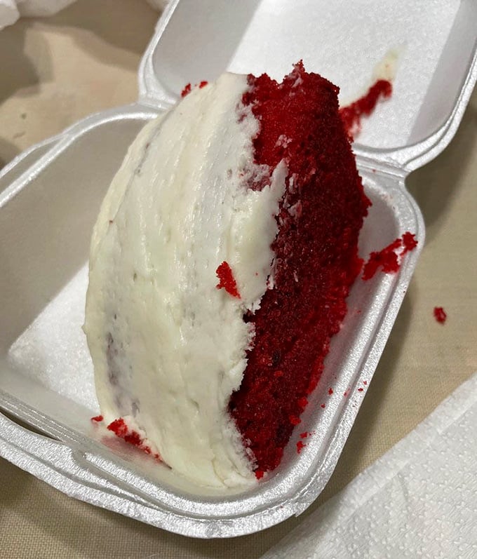 Red velvet cake that's dressed for success – vibrant crimson cake embraced by cream cheese frosting that's tangy, sweet, and utterly irresistible.