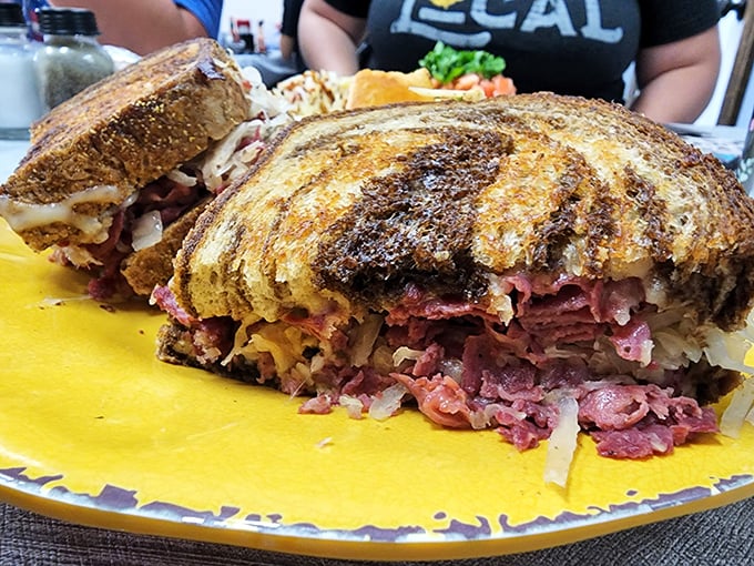 The Reuben sandwich here doesn't mess around—it's packed with enough corned beef to make your cardiologist wince and your taste buds applaud.