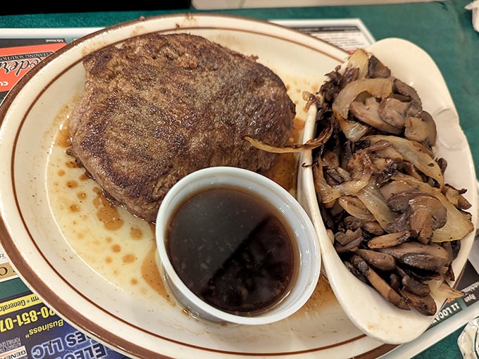 This ribeye steak with sautéed mushrooms and au jus isn't just dinner—it's the reason elastic-waist pants were invented.