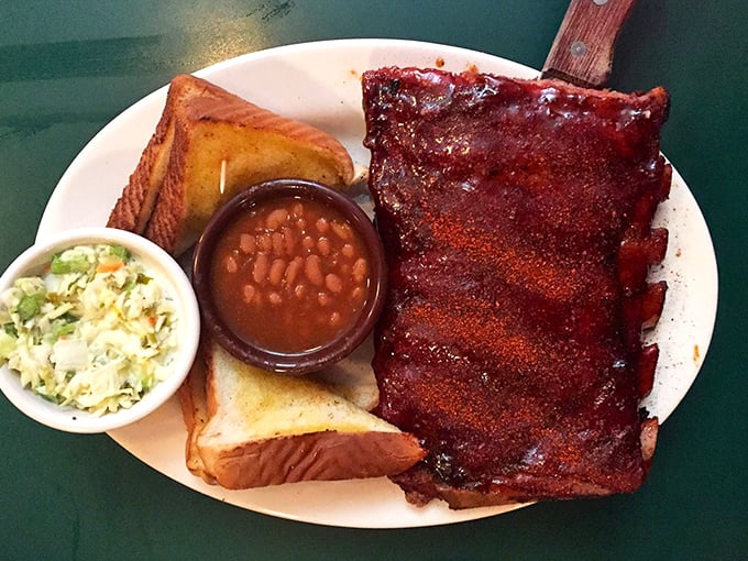 These ribs don't just fall off the bone – they practically leap into your mouth. Served with sides that refuse to be mere afterthoughts.
