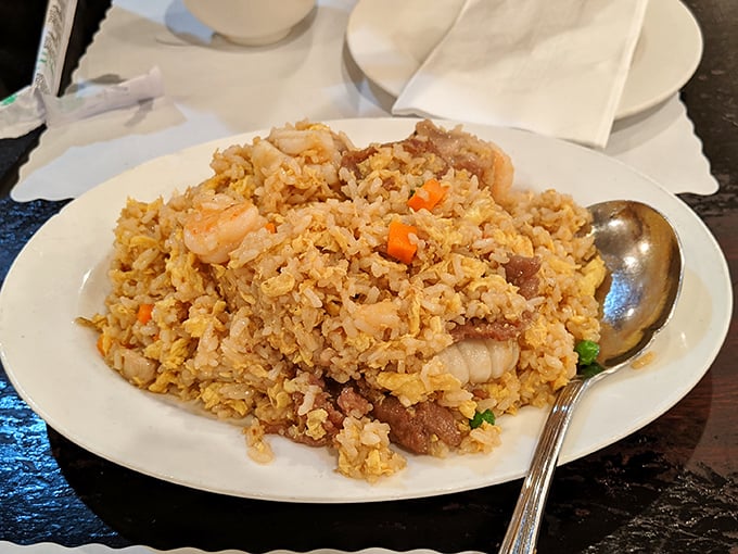 Fried rice that puts all midnight takeout memories to shame. Each grain distinct, each bite studded with savory treasures.