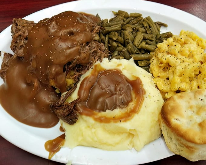 Roast beef dinner that would make your grandmother nod in approval. That gravy lake in the mashed potatoes? Pure Midwestern poetry.