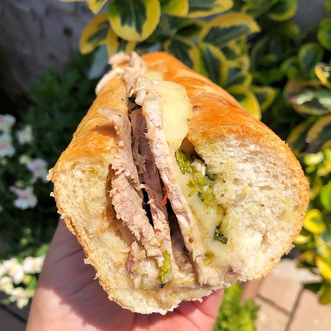 A roast pork sandwich that makes you understand why Philadelphians debate sandwiches with the same passion others reserve for politics or sports.