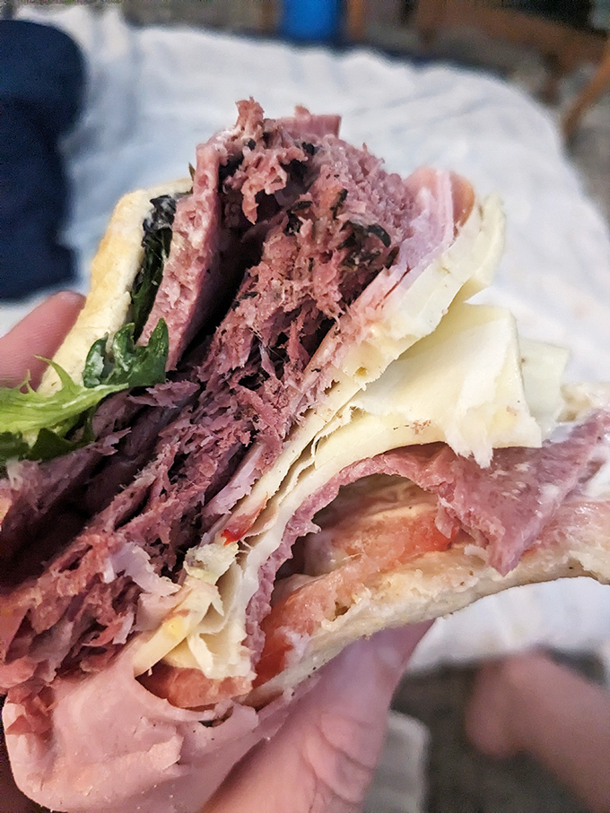 The roast beef sandwich doesn't just have layers—it has chapters, each one telling a different story of flavor and texture.