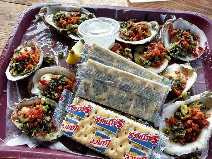 Oysters Rockefeller served with saltines – proof that sometimes the most unpretentious companions make the most memorable dining experiences.