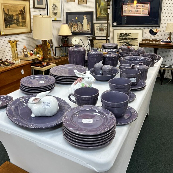 Purple stoneware that makes modern dishes look positively boring. The ceramic bunny seems to be judging your current dinnerware choices.