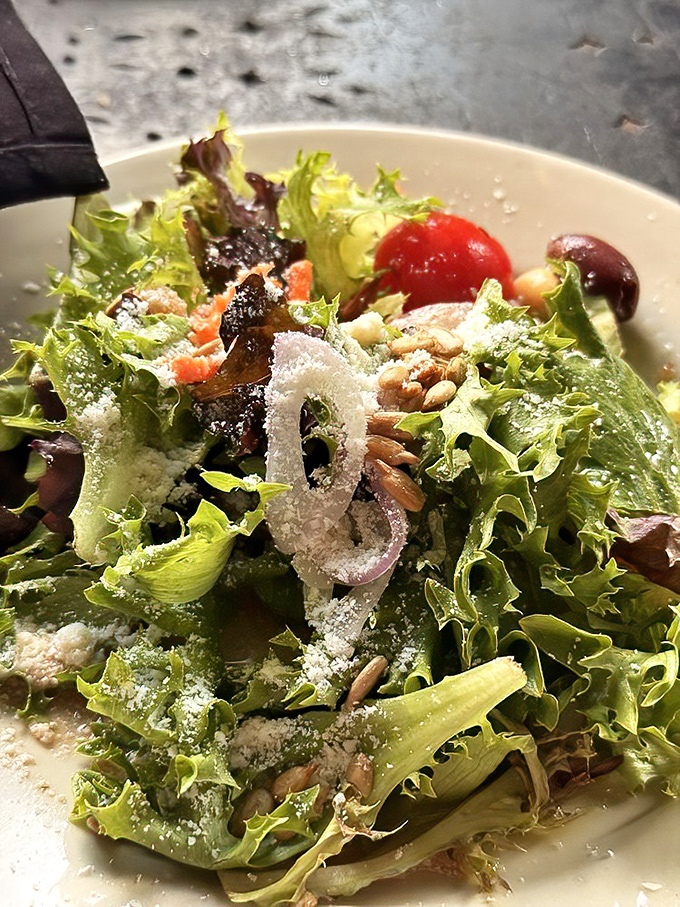 Even the salad looks like it's trying to steal the show from the pasta course.