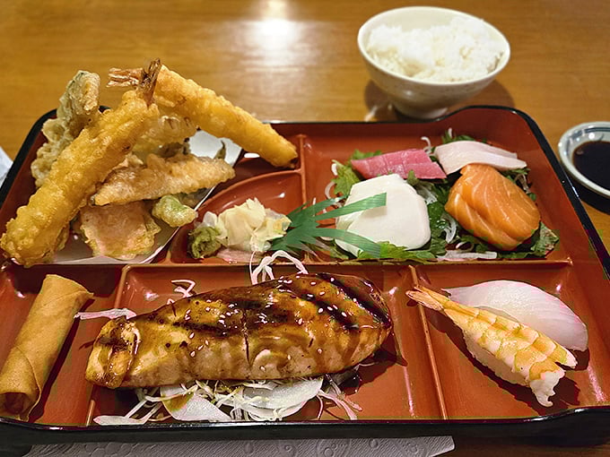 This bento box is the Swiss Army knife of meals—tempura, sashimi, teriyaki, and rice, all in one tidy package. Organization never tasted so good.