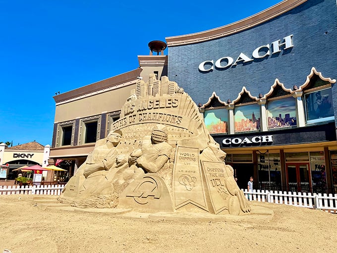 This isn't just sand—it's a masterpiece outside Coach celebrating Los Angeles culture, proving even the decorations at Citadel have artistic ambitions.