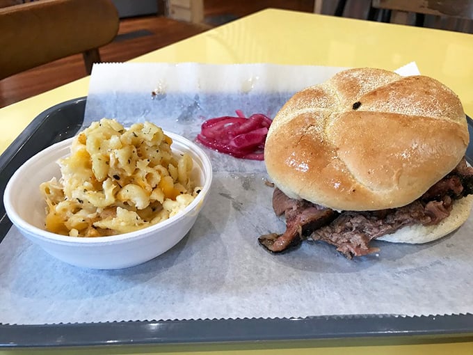 The pulled pork sandwich—humanity's greatest invention since fire itself. That golden bun is about to embark on the tastiest job of its life. 
