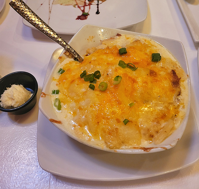 Not your cafeteria's scalloped potatoes—this bubbling masterpiece of cheese and potato is what comfort food dreams about at night.