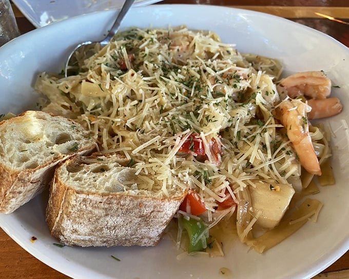 Pasta that doesn't just sit there looking pretty—it works for a living. Those plump shrimp are practically begging to be the center of attention. 