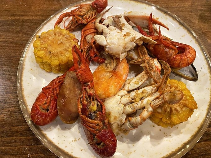 A plate that answers the eternal question: "Why choose one seafood when you can have them all?" Corn included for moral support.