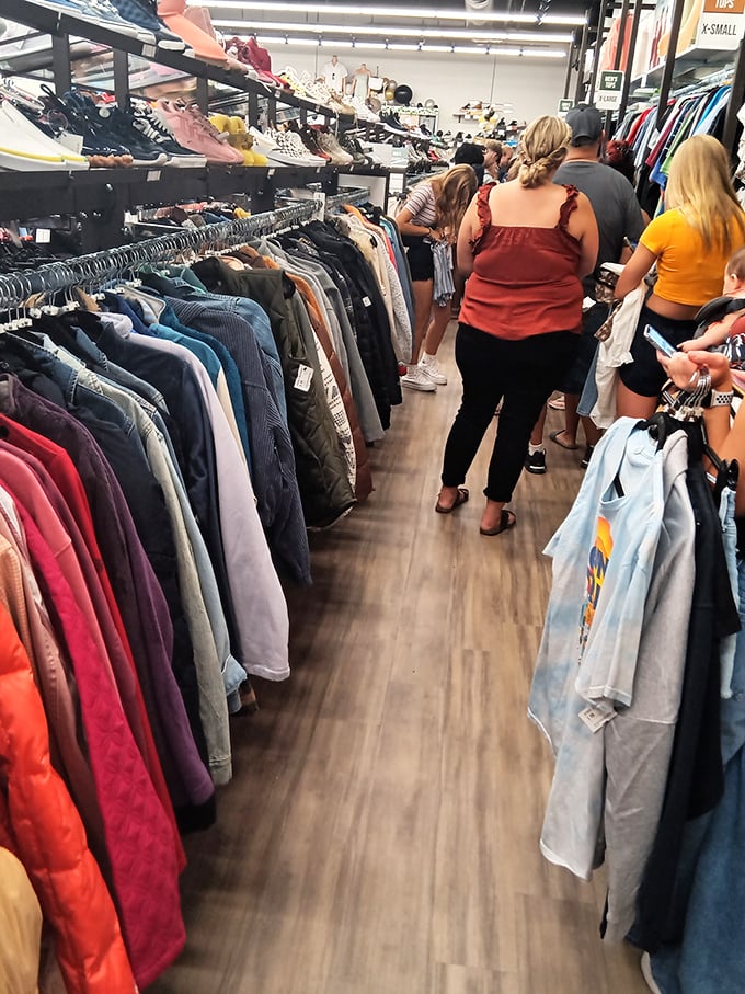 The thrill of the hunt brings shoppers together in these well-organized aisles. Fashion democracy in action—no trust funds required.