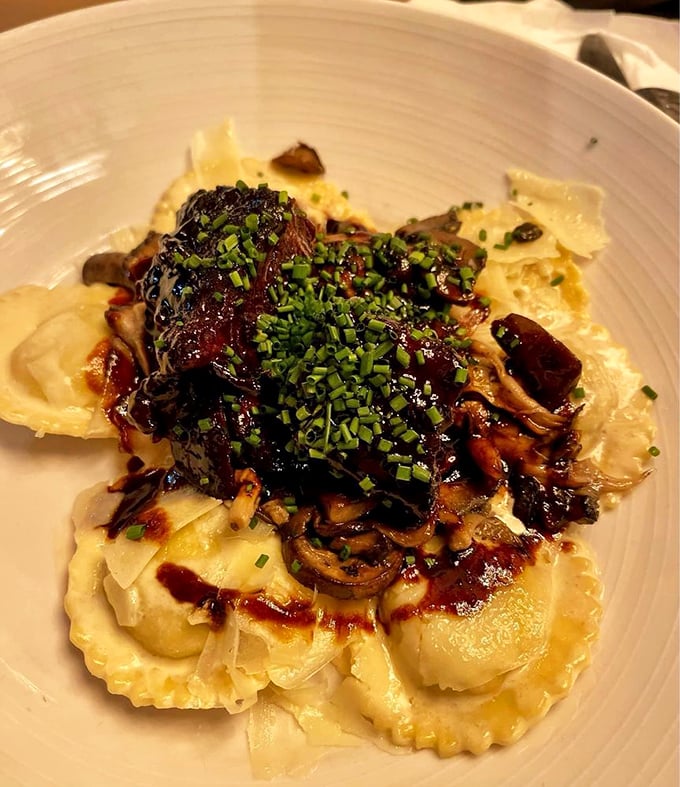 Ravioli swimming in a pool of short rib and mushroom glory – proof that pasta can dress up for a night out and still be comforting.