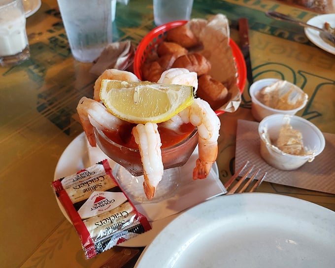 The classic shrimp cocktail—hanging off the glass like eager swimmers taking a break from laps. That cocktail sauce means business.