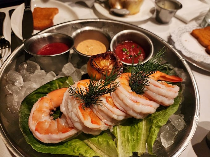 The shrimp cocktail at Bern's isn't just appetizer—it's aquatic jewelry, each plump crustacean resting on ice like treasures from Neptune's vault.