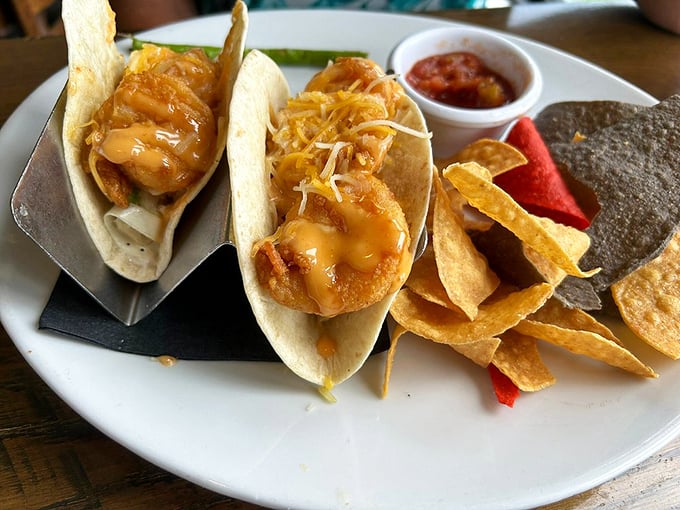 These shrimp tacos aren't just lunch—they're a vacation on a plate, with crispy shells cradling plump shrimp dressed in a sauce worth bottling and taking home.