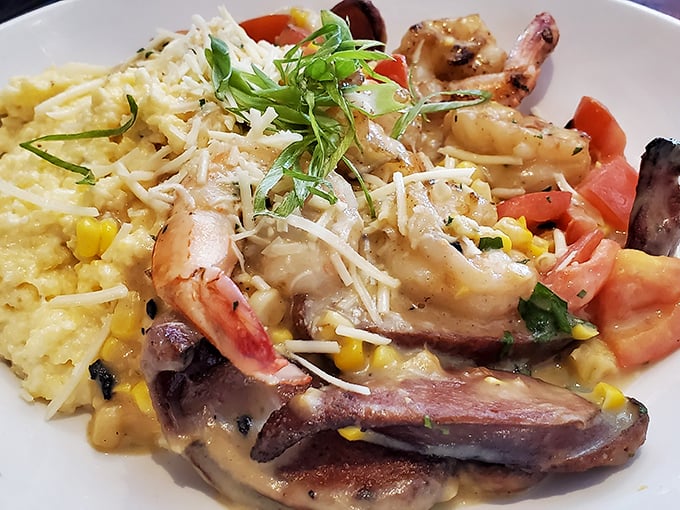 Shrimp and grits that would make a Charleston chef nod in approval. Creamy, cheesy goodness punctuated by plump shrimp and savory bacon—comfort food elevated to art form.