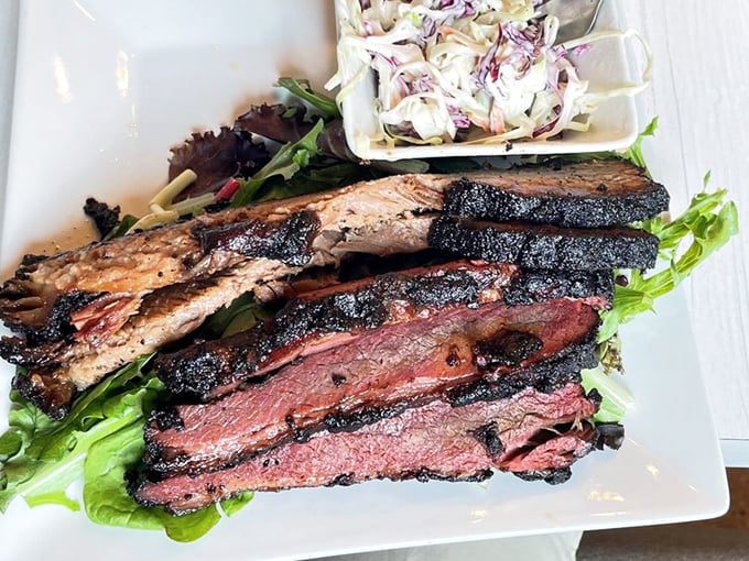 Smoke rings don't lie—this brisket has the kind of perfect pink halo that barbecue dreams are made of.