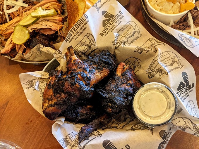 These smoke-kissed wings with their obsidian bark aren't just appetizers—they're the reason napkin manufacturers stay in business.